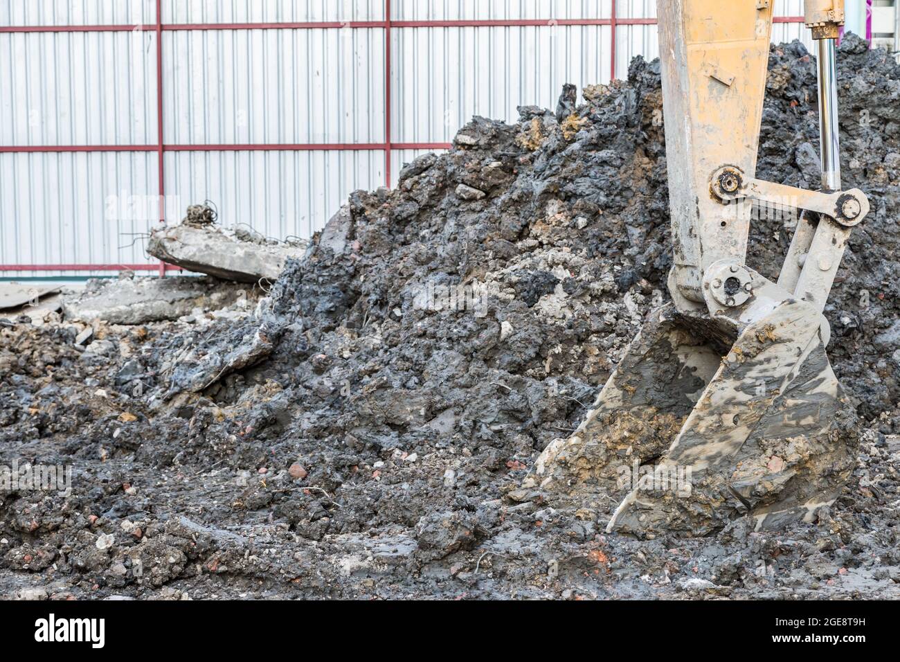excavator scoop digging on the ground background Stock Photo - Alamy