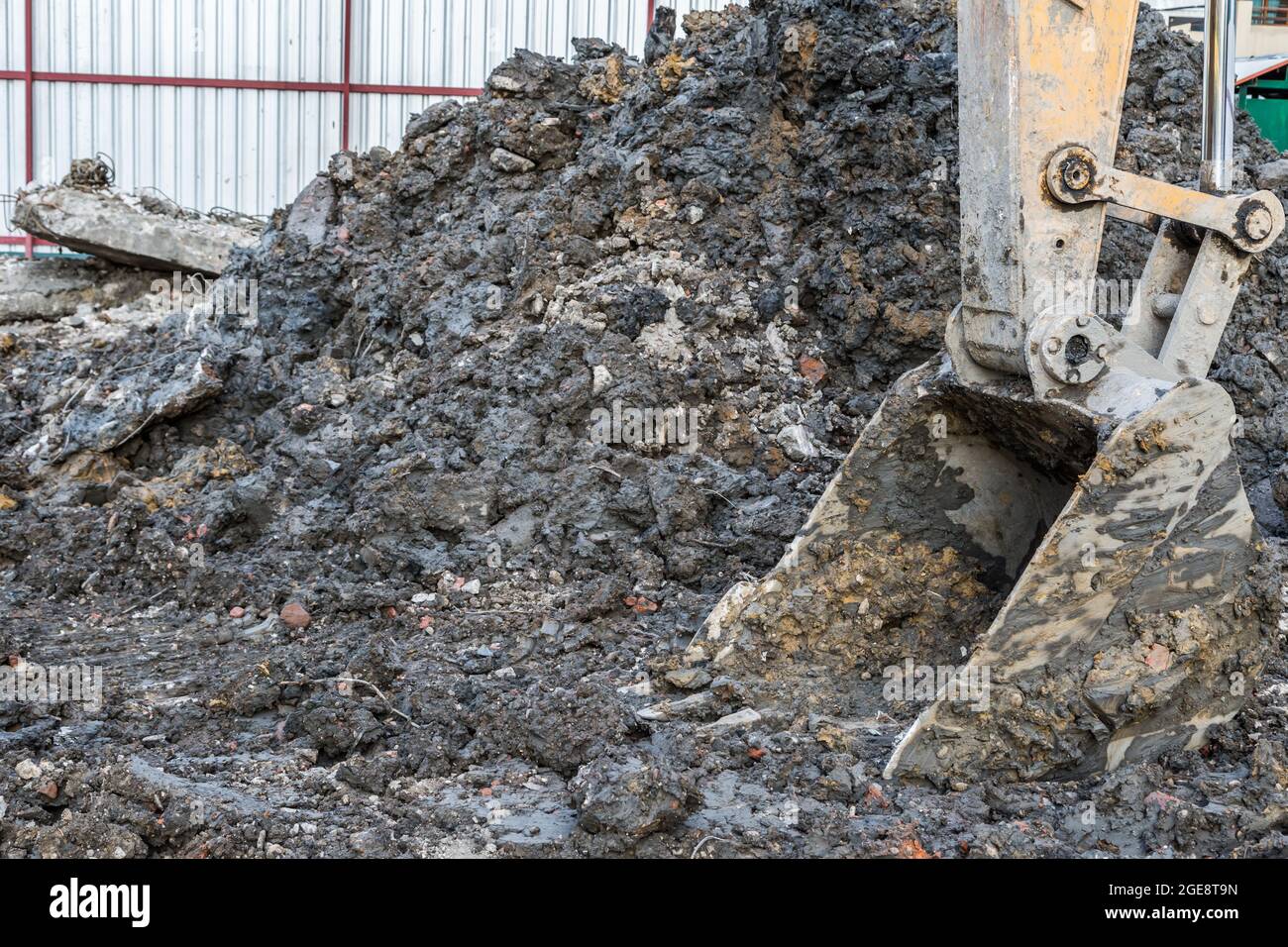 excavator scoop digging on the ground background Stock Photo - Alamy