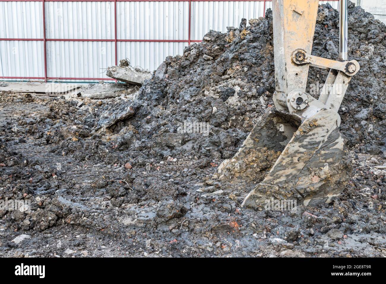 excavator scoop digging on the ground background Stock Photo - Alamy