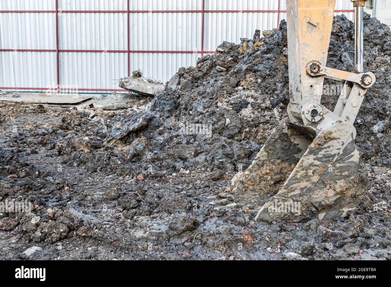 excavator scoop digging on the ground background Stock Photo - Alamy
