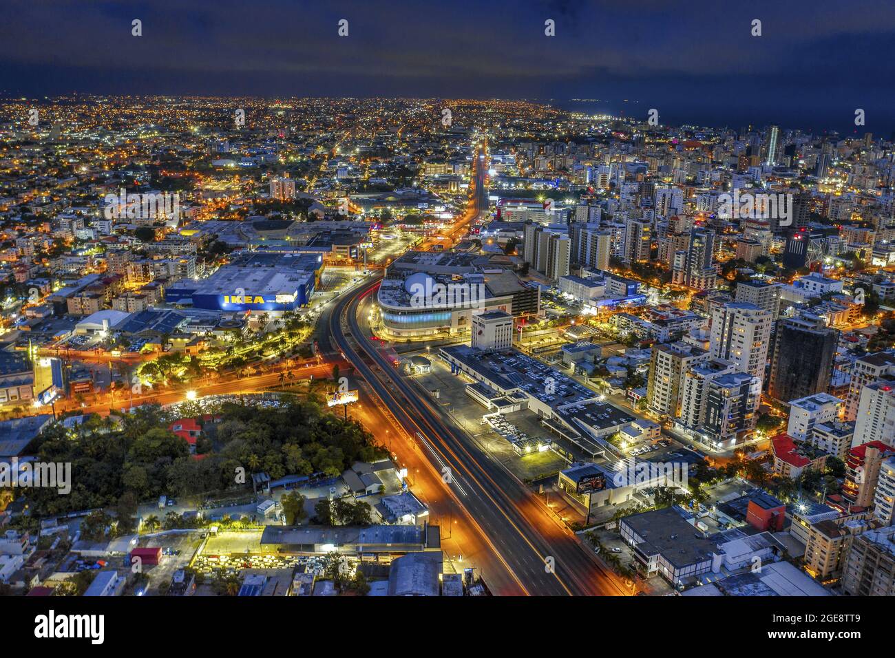 Cityscape of Santo Domingo surrounded by lights at night in the ...