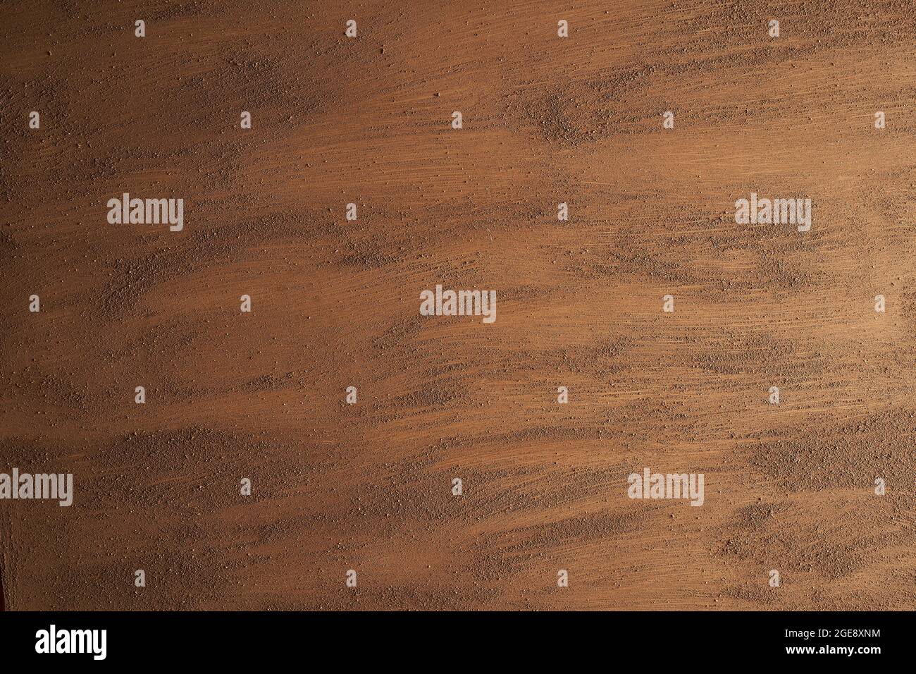 Closeup of a smooth marbled brown with brush strokes for background or ...