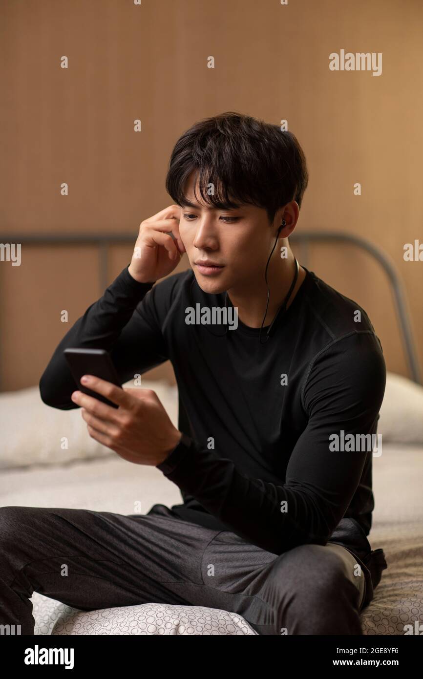 Man and bed one man only getting up hi-res stock photography and images ...