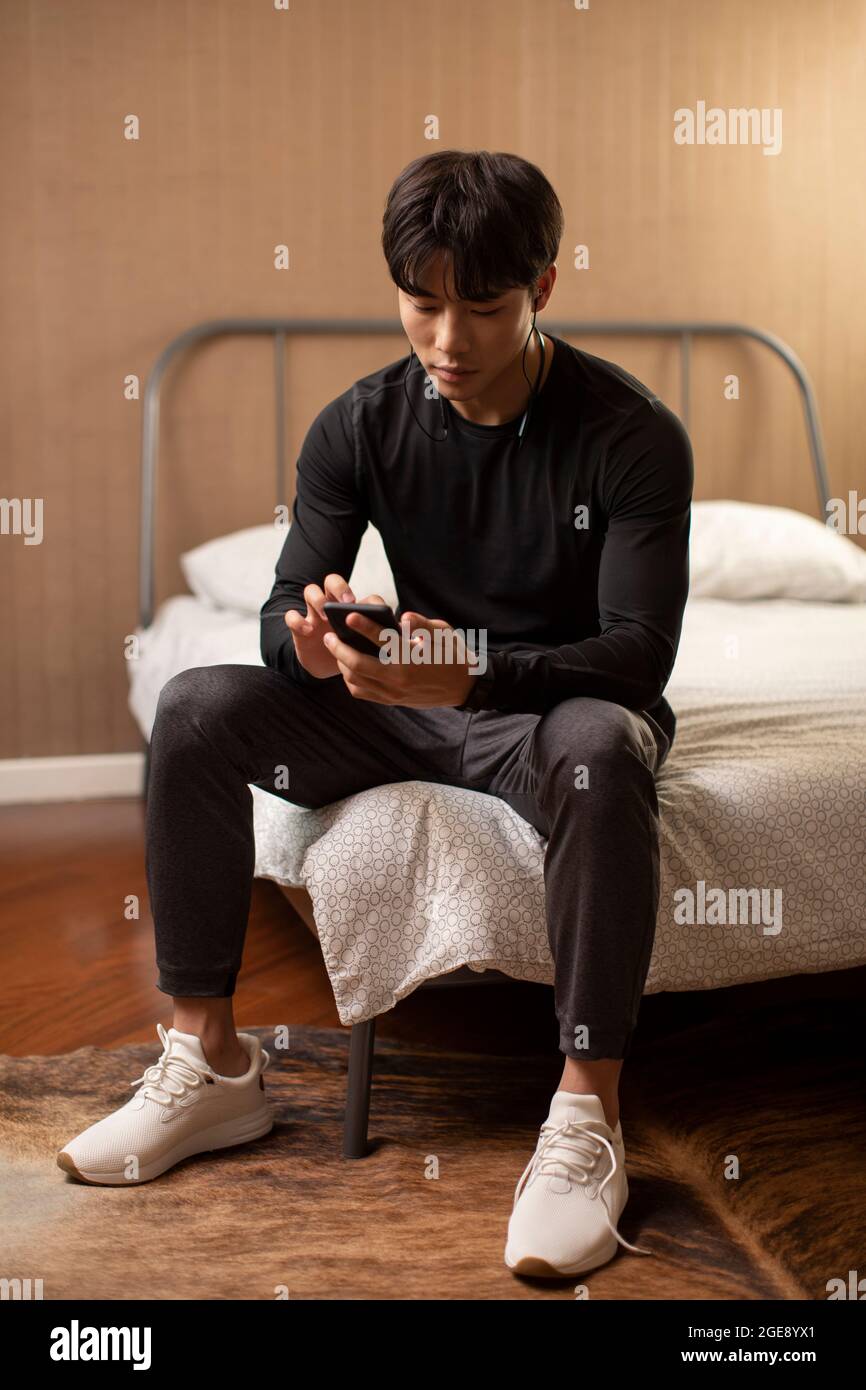 Man and bed one man only getting up hi-res stock photography and images ...