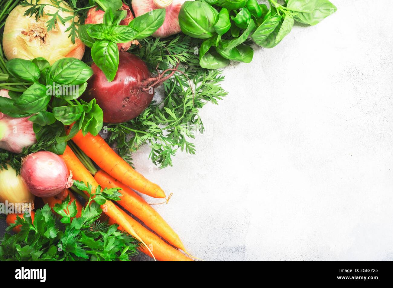 Fresh root vegetables and herbs. Healthy food, autumn cooking concept ...