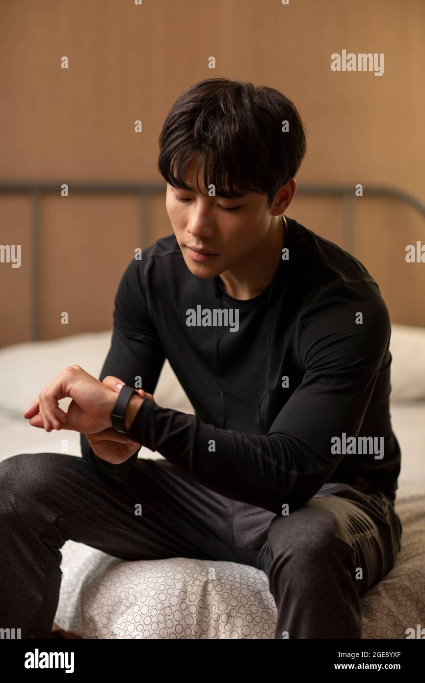 Man and bed one man only getting up hi-res stock photography and images ...