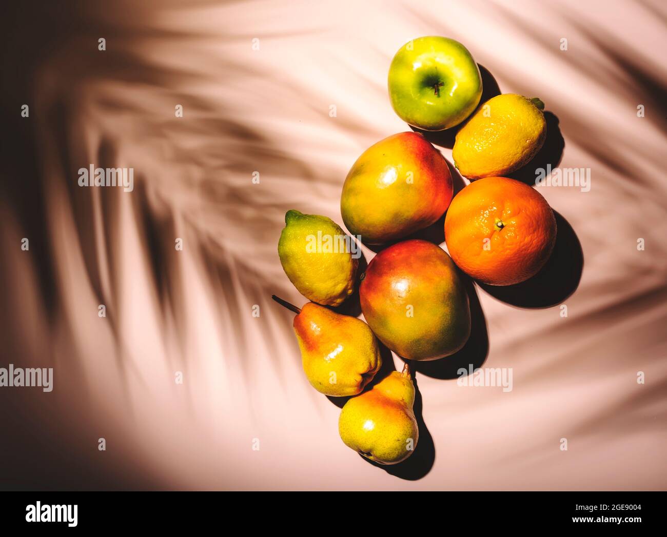 Summer fruits top view. Contemporary still life, lime green background ...
