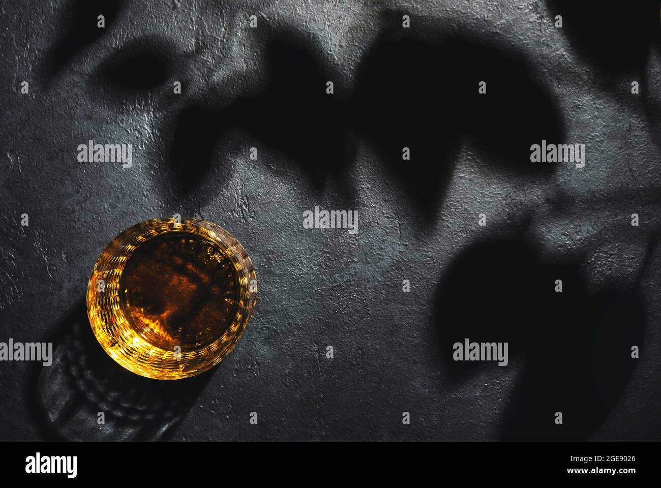 American bourbon whiskey in glasses and bottle, black background with ...