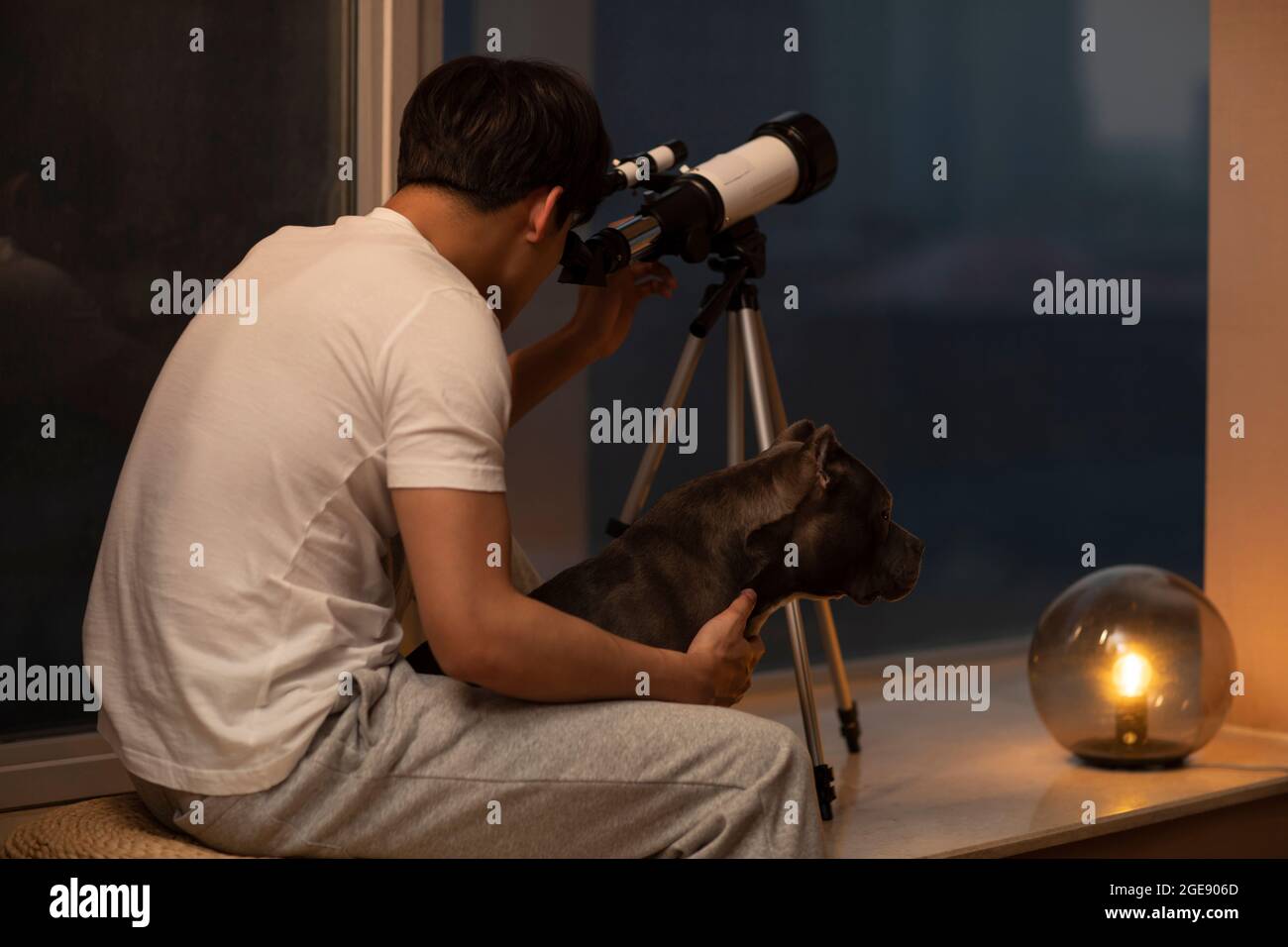 Person using telescope at night hi-res stock photography and images - Alamy