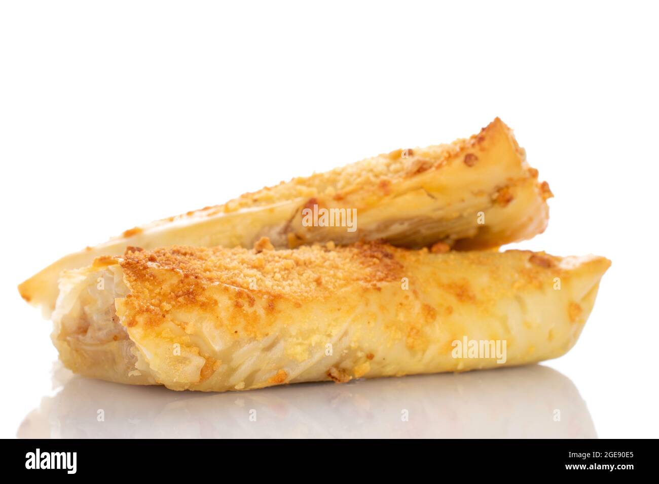 Two homemade apple mini strudel, close-up isolated on white Stock Photo ...