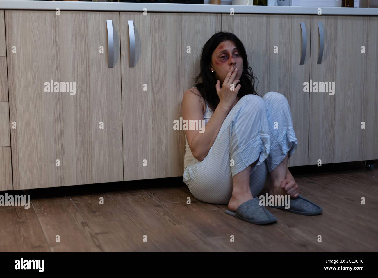 Close up of crying wife being victim of physical trauma and domestic ...