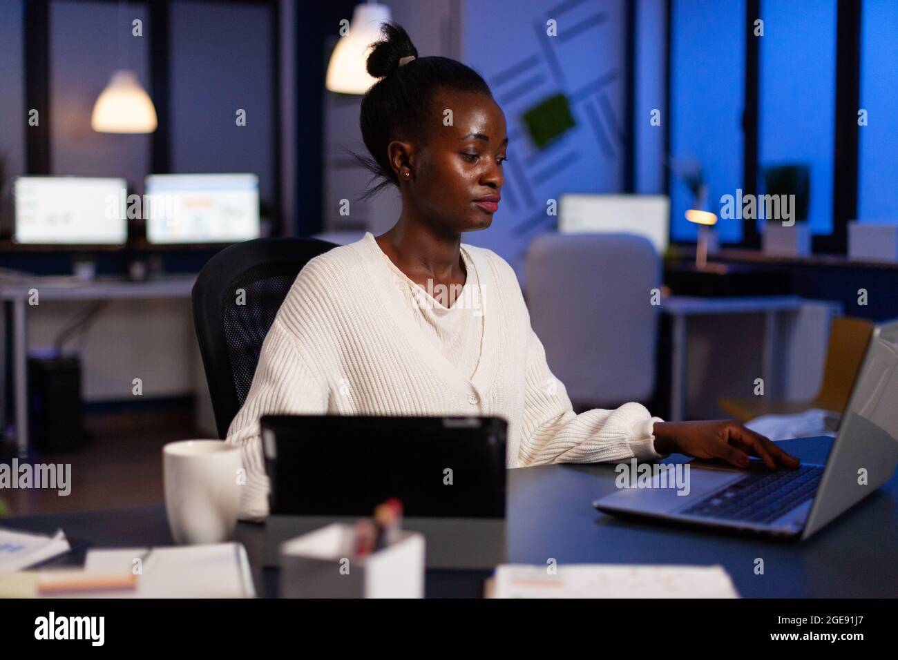 Multitasking focused african american businesswoman planning management ...