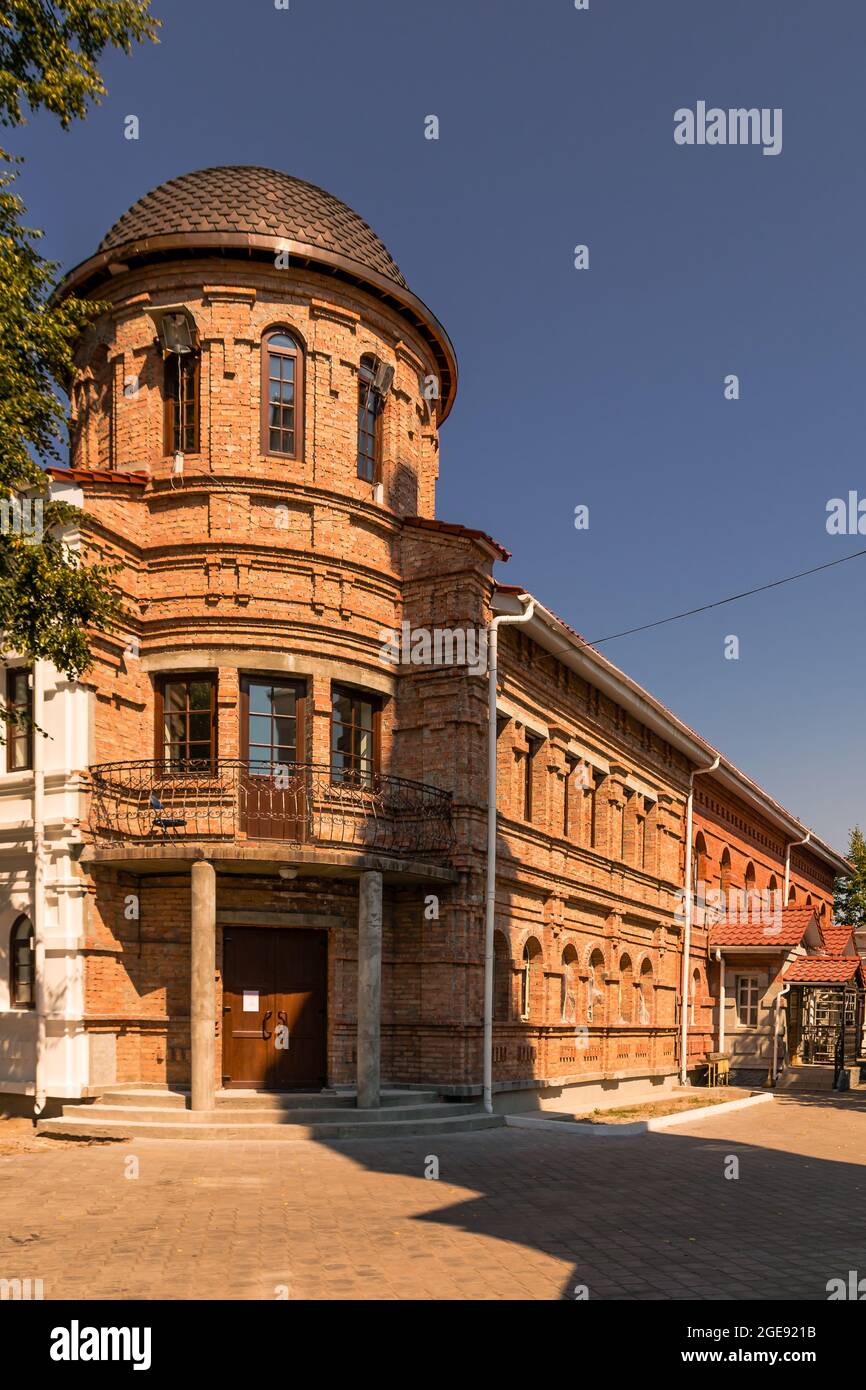 The red brick building is in the process of restoration Stock Photo - Alamy