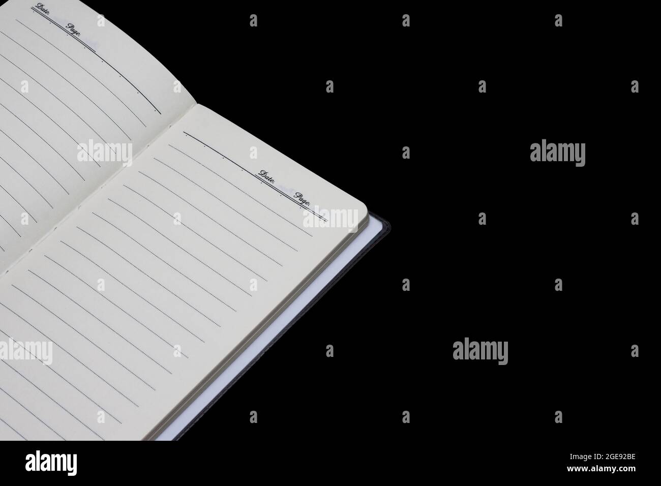 An open diary on isolated black background with copy space Stock Photo ...