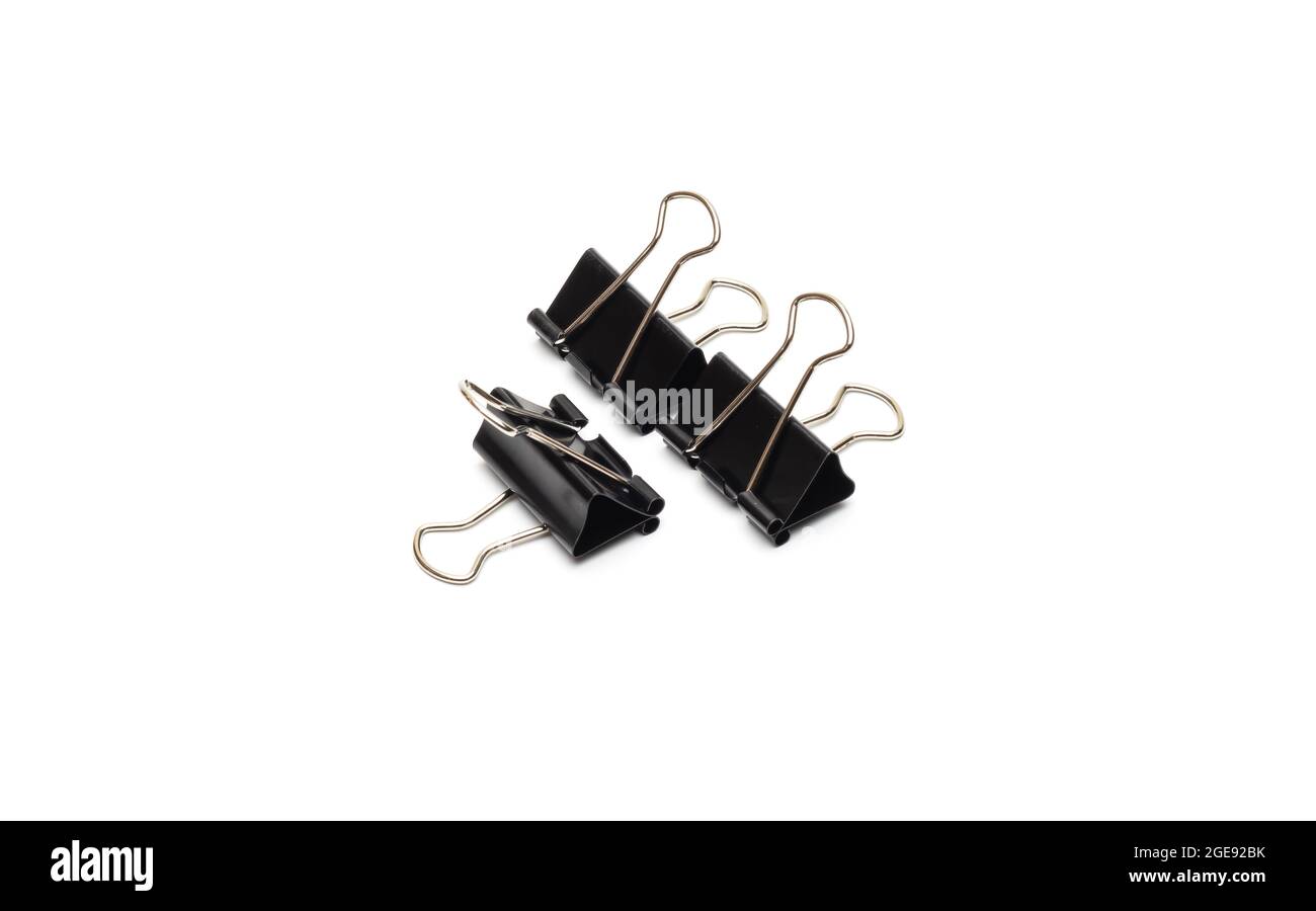 Black metal binder paper clips on an isolated white background Stock ...