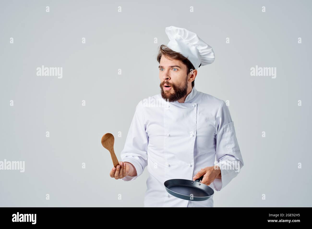 professional chef frying pan in hands restaurant kitchen Stock Photo ...