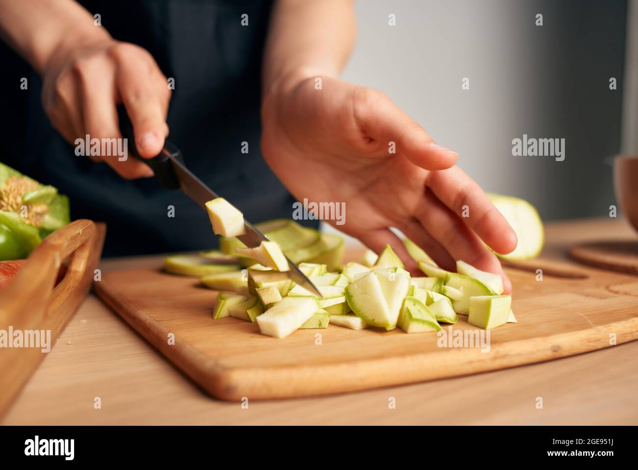 slicing vegetables kitchen cooking healthy eating Stock Photo - Alamy