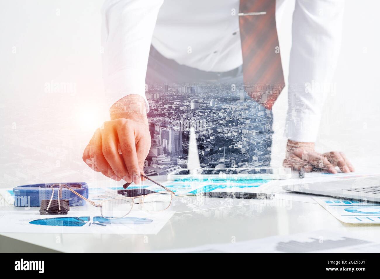 Close-up man hand with analytics Stock Photo - Alamy