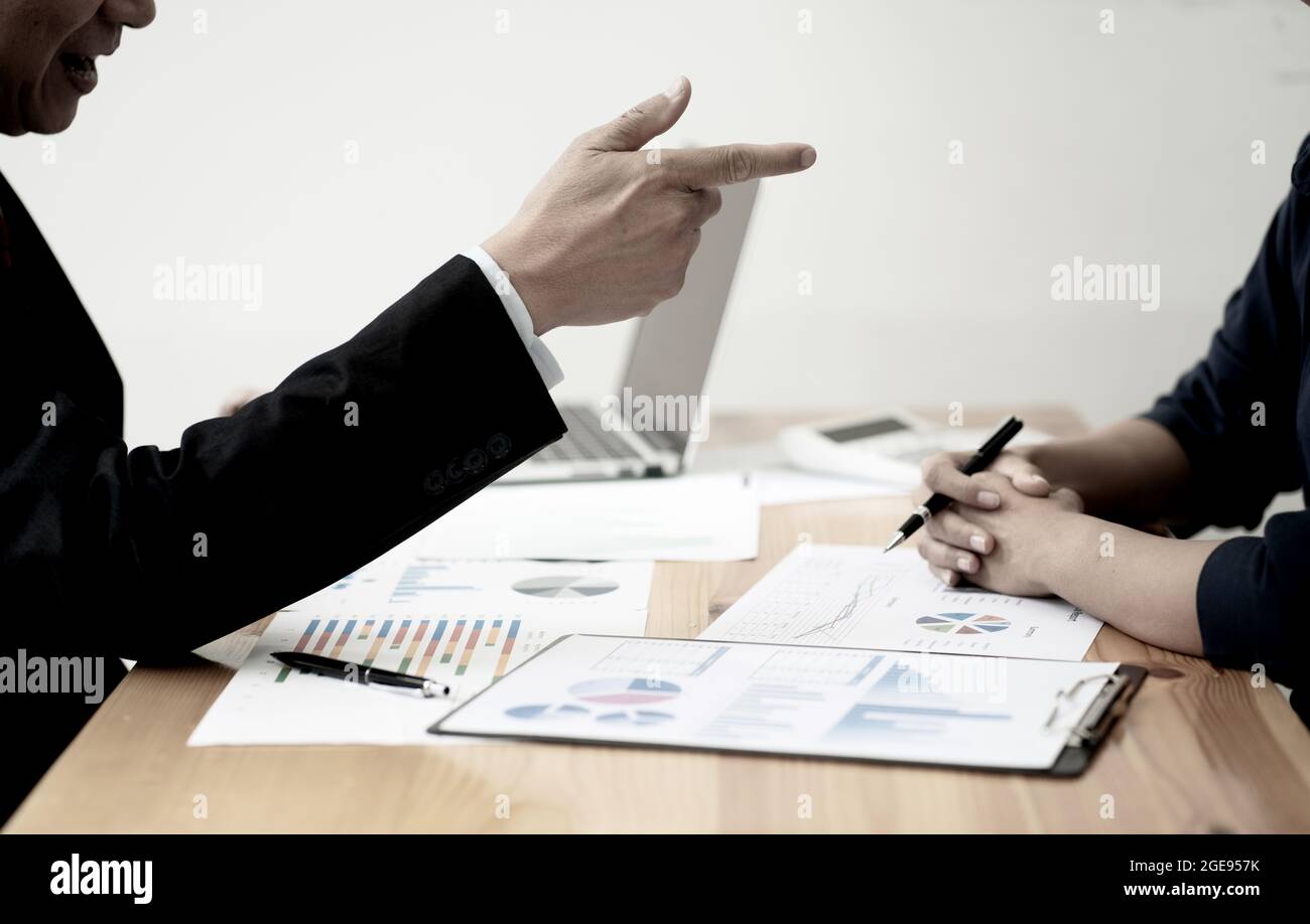 Businessman or boss point their fingers at the team to encourage and ...