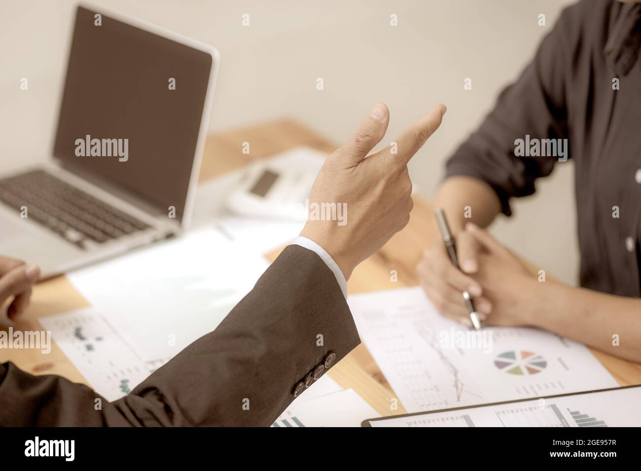 Businessman or boss point their fingers at the team to encourage and ...