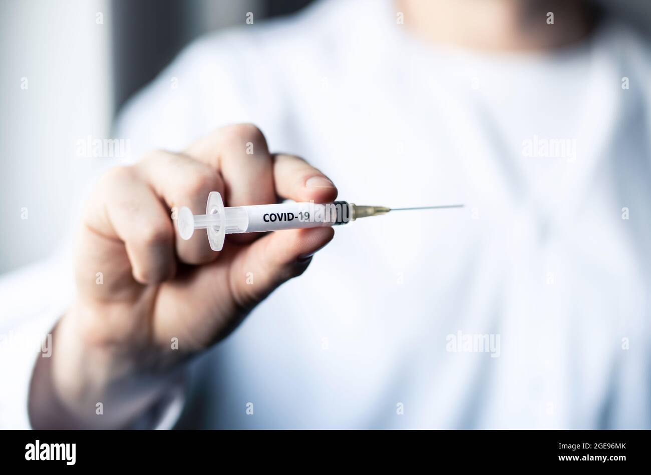 Covid 19 vaccine, corona virus injection and immunization. Doctor or ...