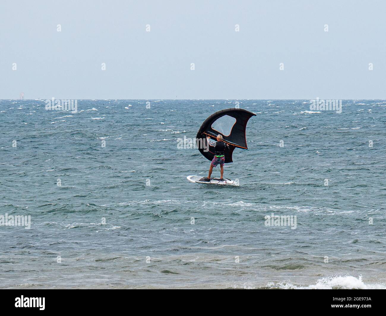 Man during wind surfing hi-res stock photography and images - Alamy
