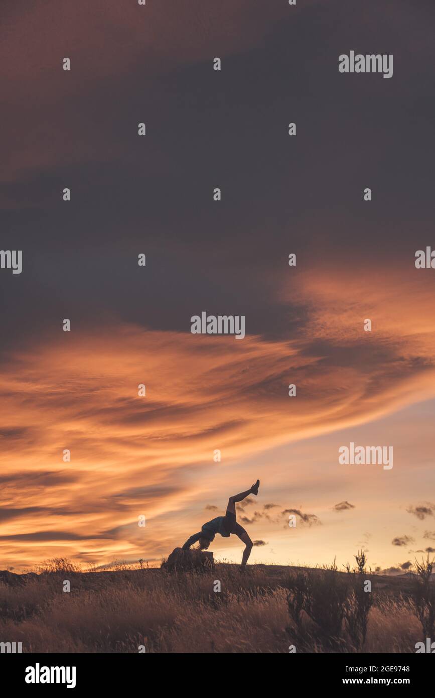 human silhouette during sunset Stock Photo - Alamy