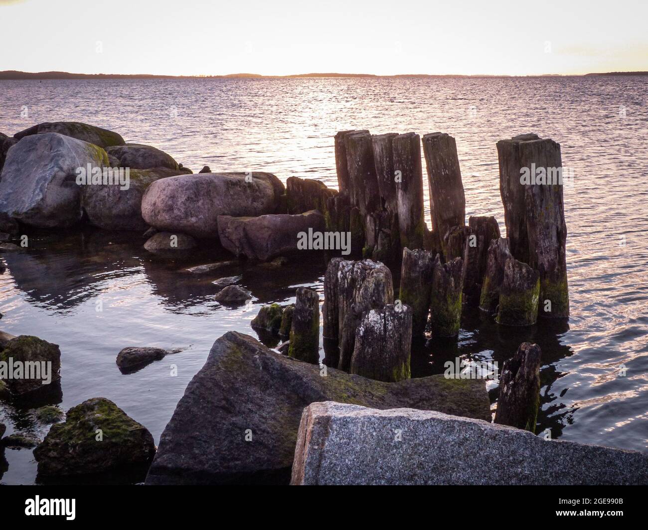 Wooden wave breakers on the coast in the Baltic Sea Stock Photo - Alamy