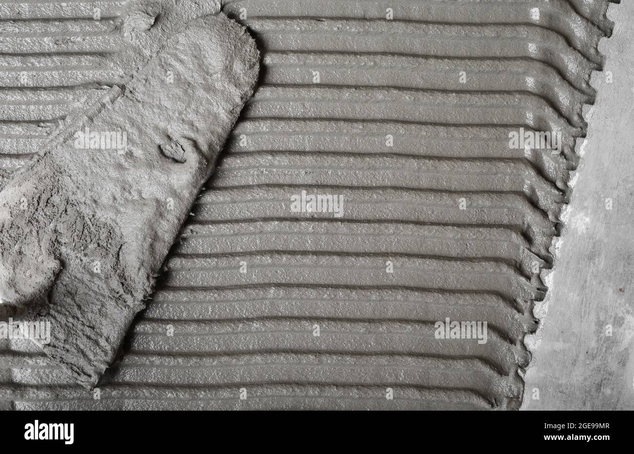 Fresh concrete tehture. Wet mortar surface. Lined grey concrete as ...