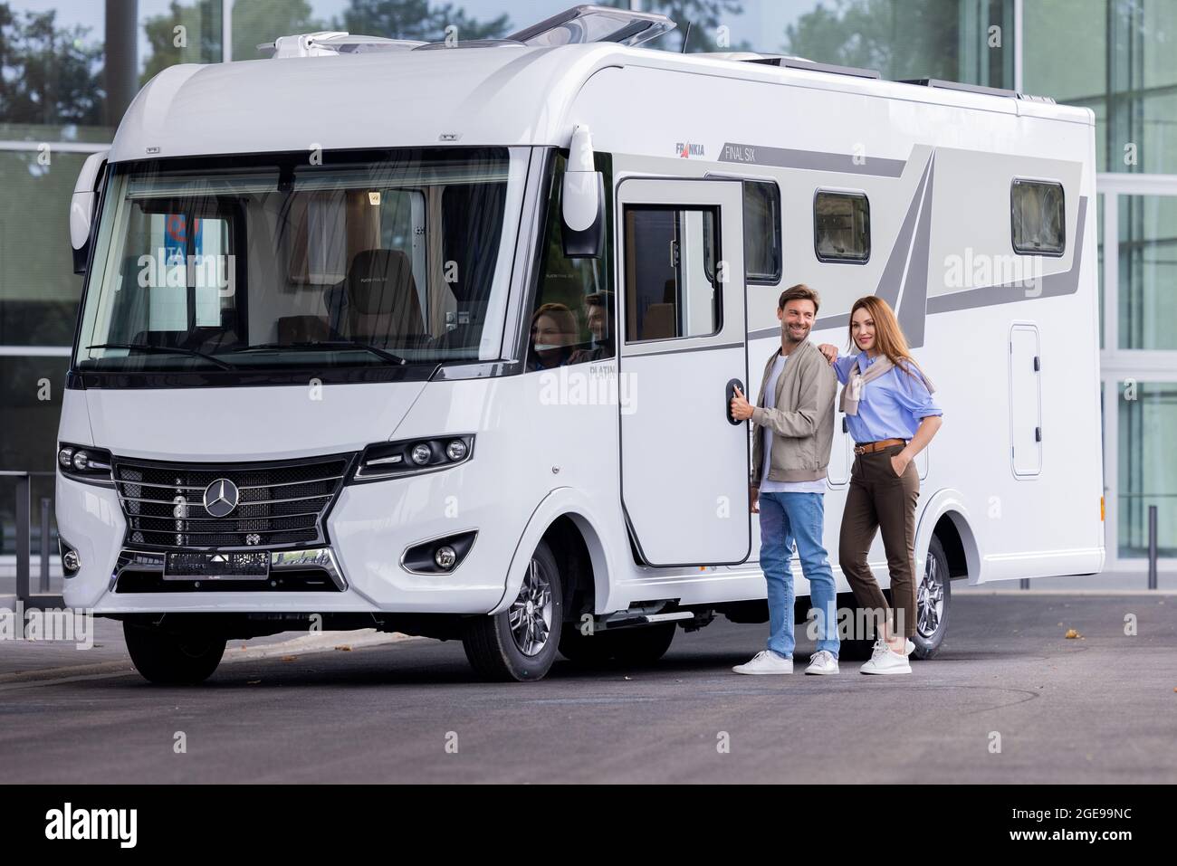 Duesseldorf, Germany. 18th Aug, 2021. Models Frieda and David stand in ...