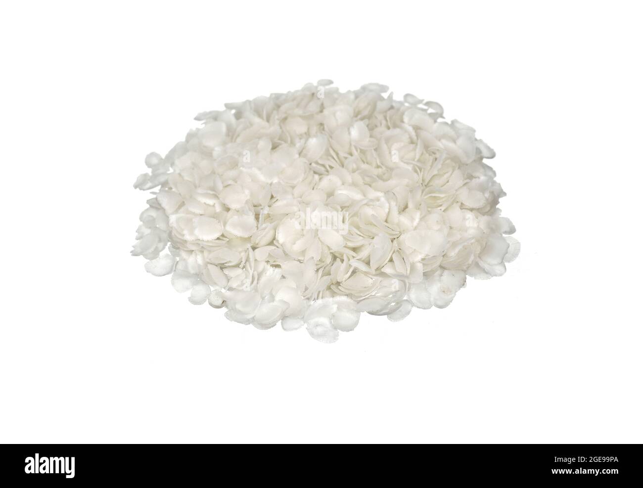 flattened rice flakes isolated on white Stock Photo - Alamy