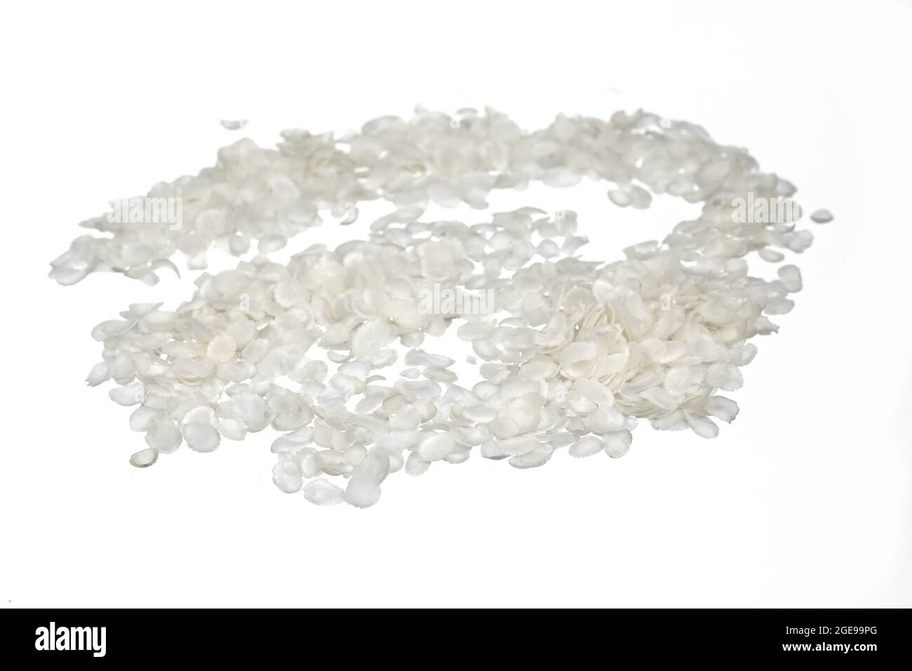 flattened rice flakes isolated on white Stock Photo - Alamy