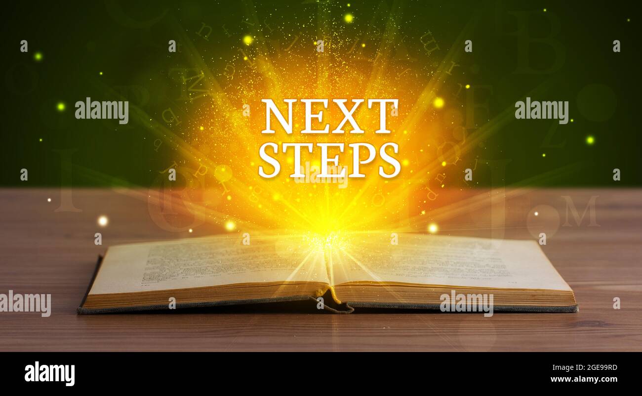 Educational inscription coming out from an open book Stock Photo - Alamy