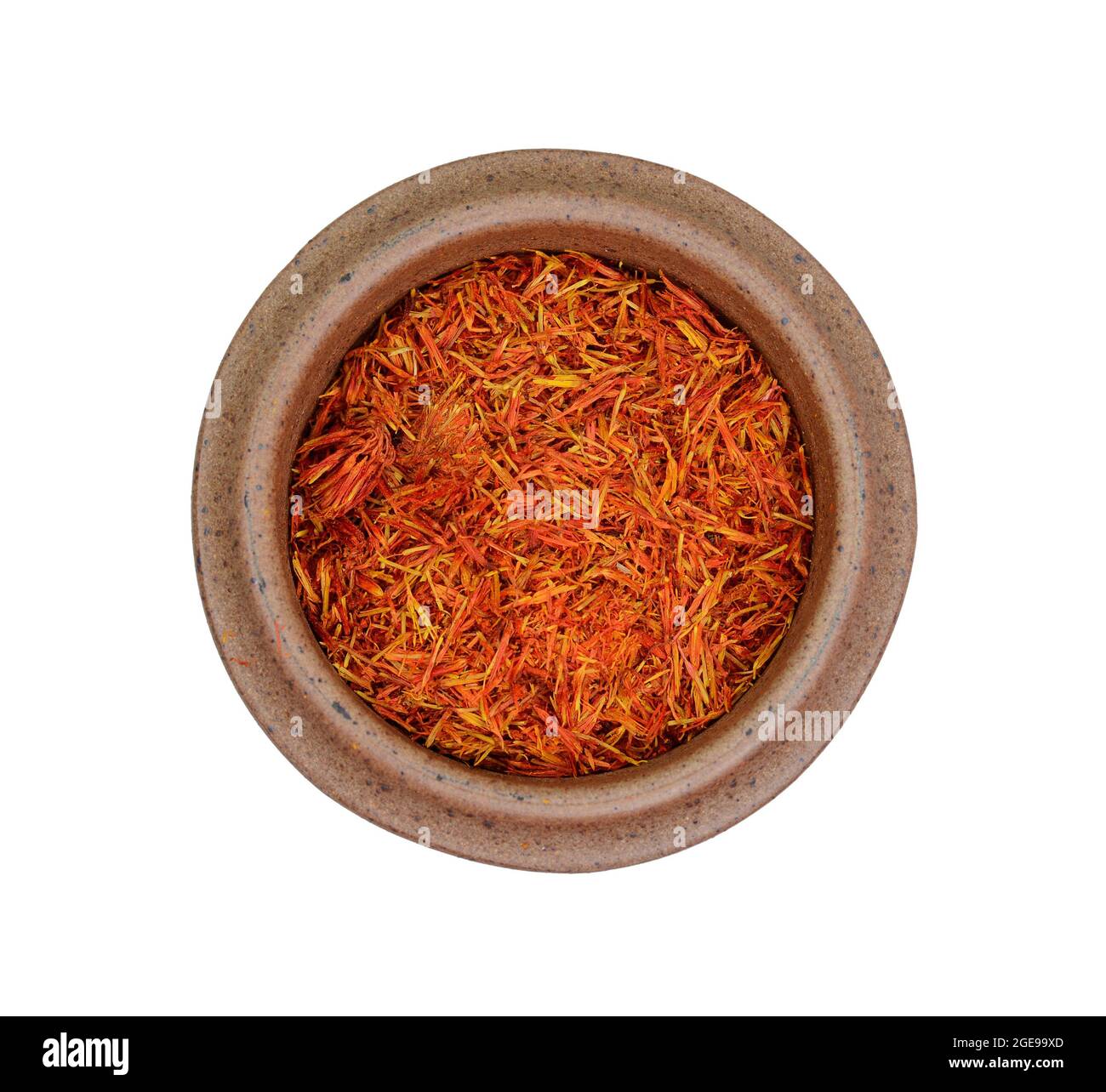 Saffron spice threads (strands) in a bowl isolated on white background ...