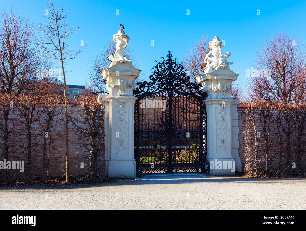 Rococo gate with marble sculptures . Entrance in Belvedere Park in ...