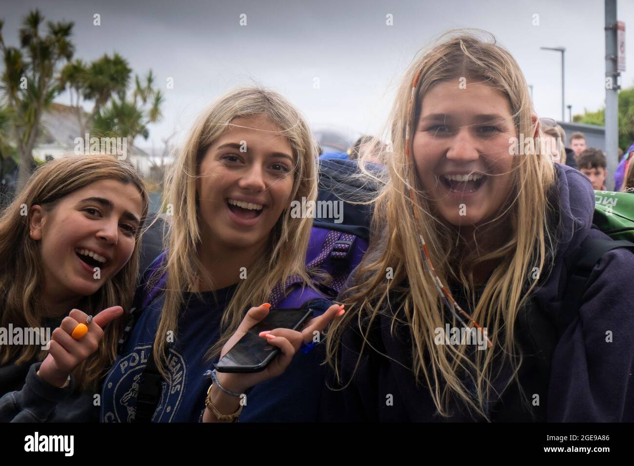 A group of excited young girls arriving at Newquay Train Station for ...