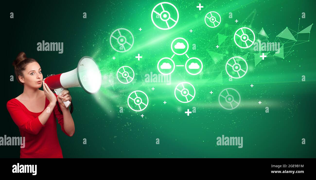 Young person with megaphone and technology related icon Stock Photo - Alamy