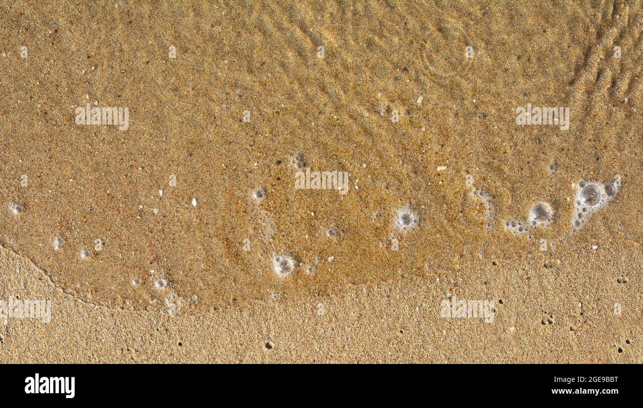 Golden Sand on the beach as background. Sand Texture. Golden sand ...