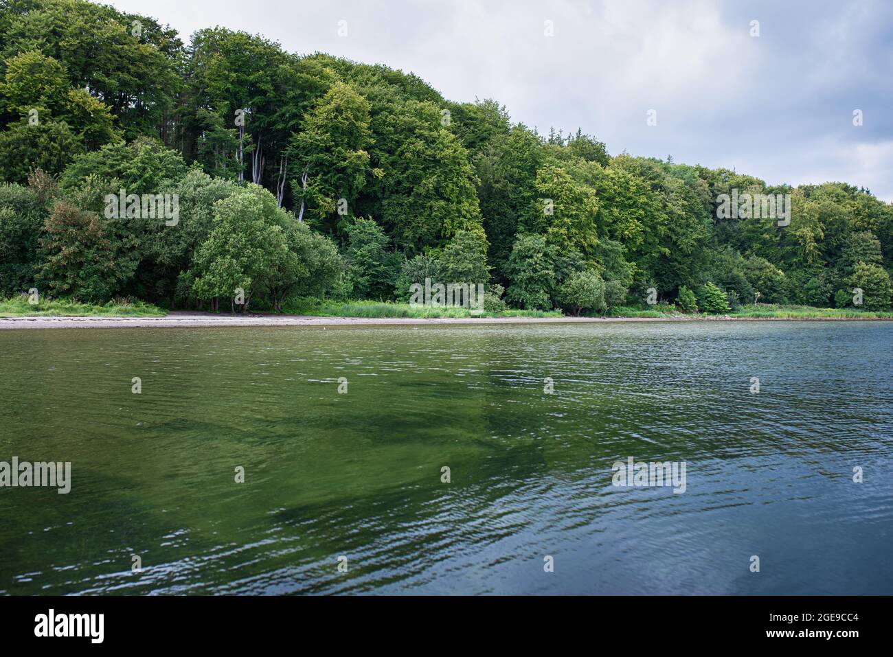 Natural landscape with green lake Stock Photo - Alamy