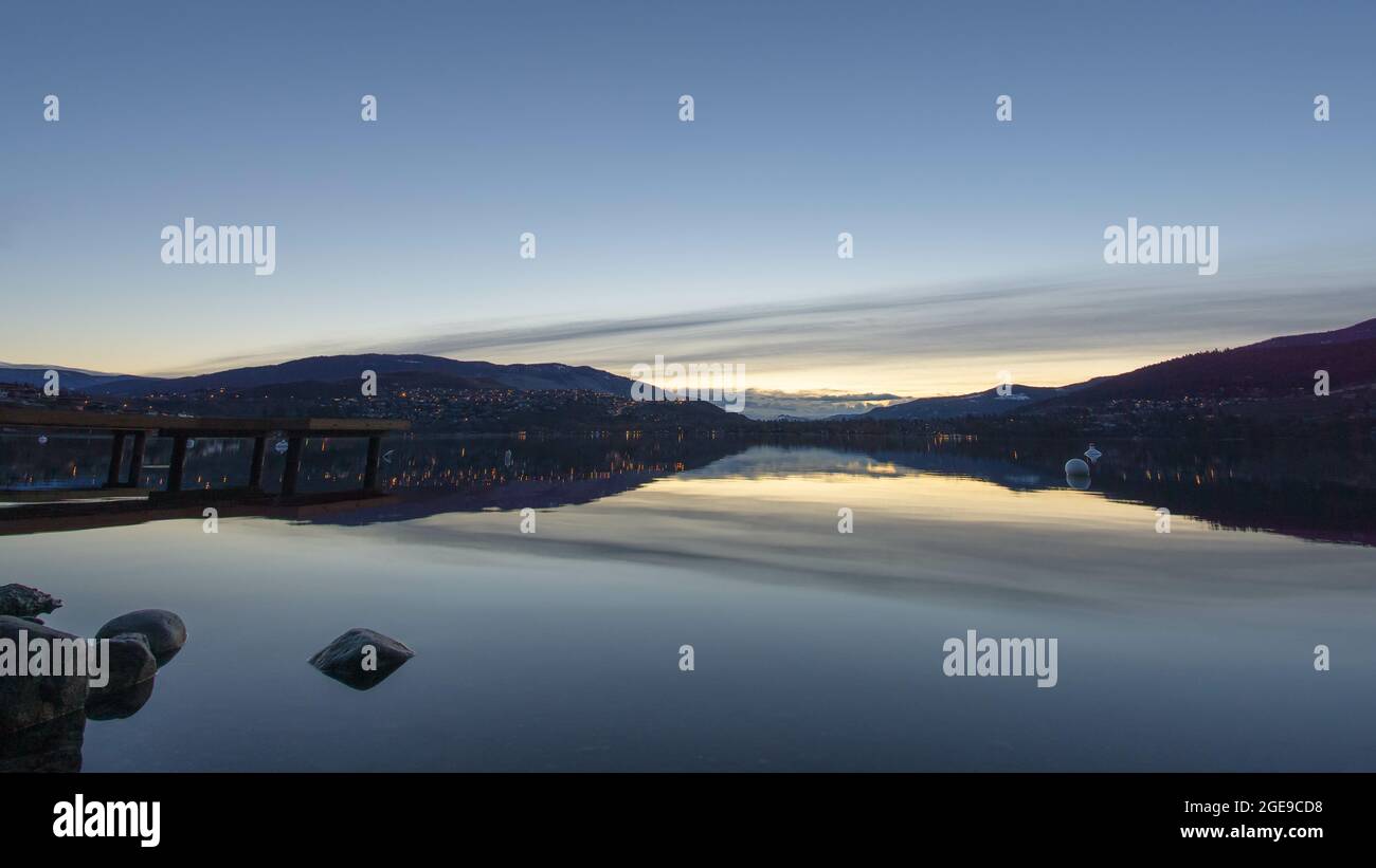 Cold sunrise on Kalamalka Lake looking toward Coldstream Stock Photo ...