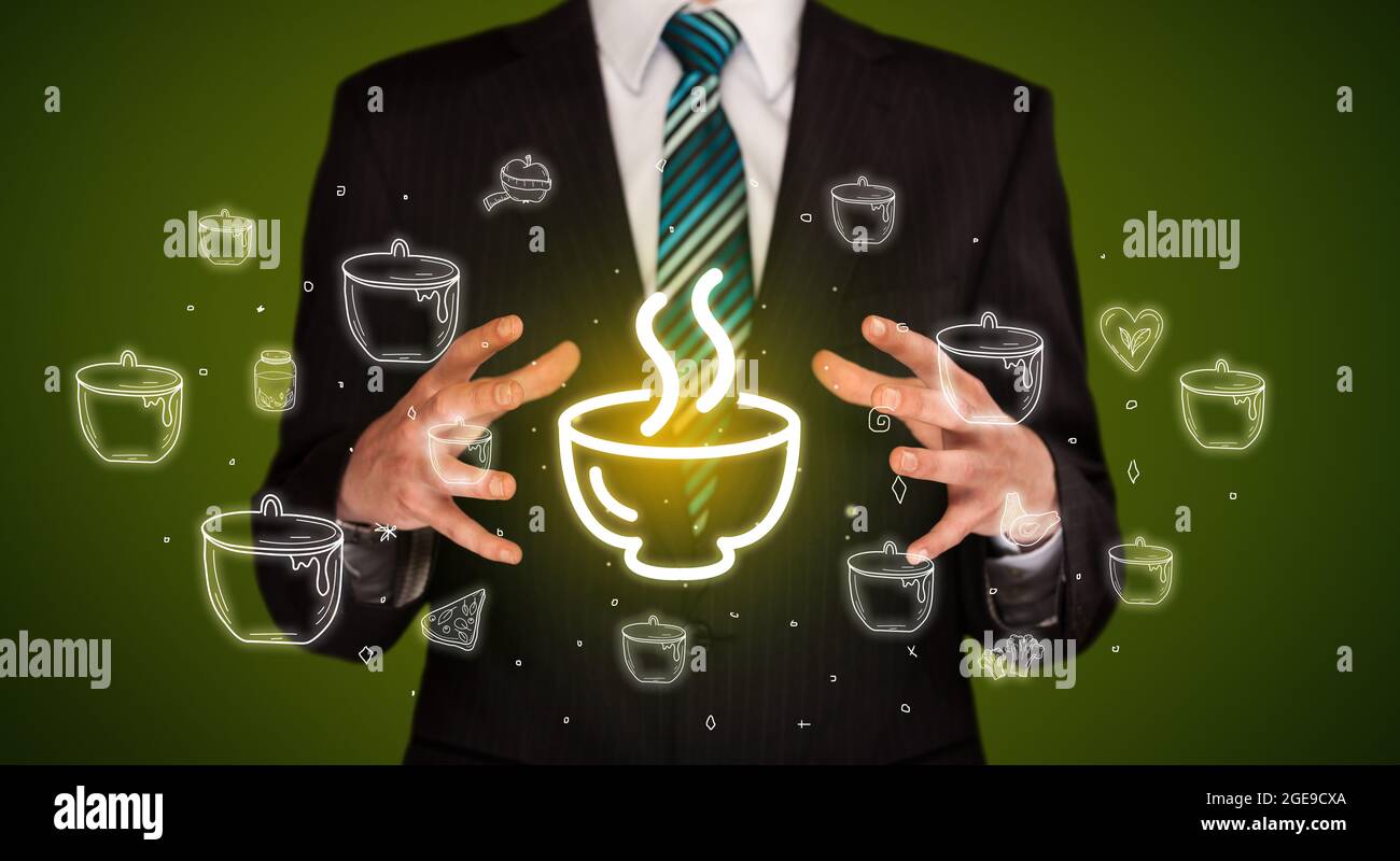 Hand holding food related icons Stock Photo - Alamy