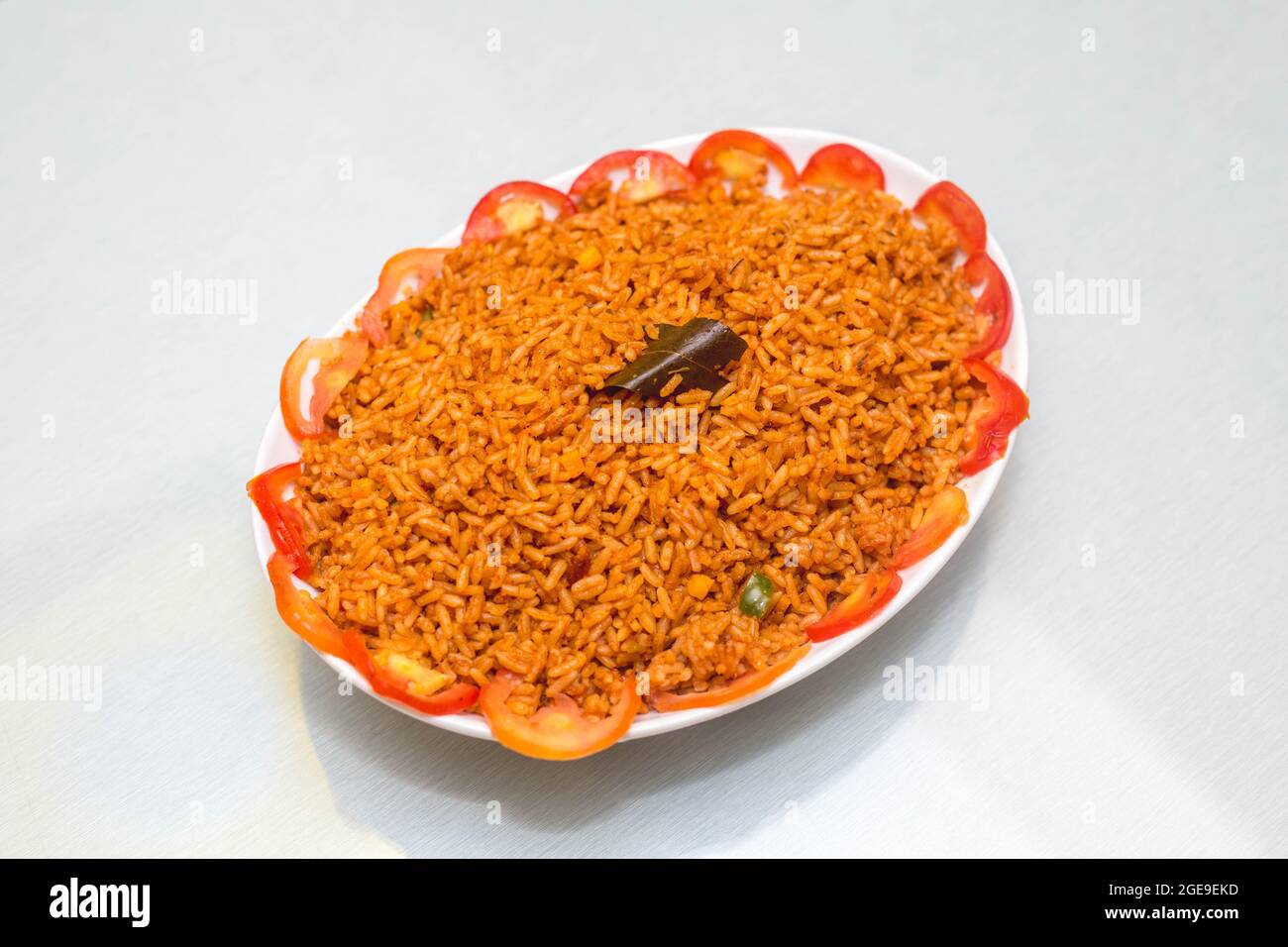 Nigerian delicious Jollof rice in plate Stock Photo - Alamy