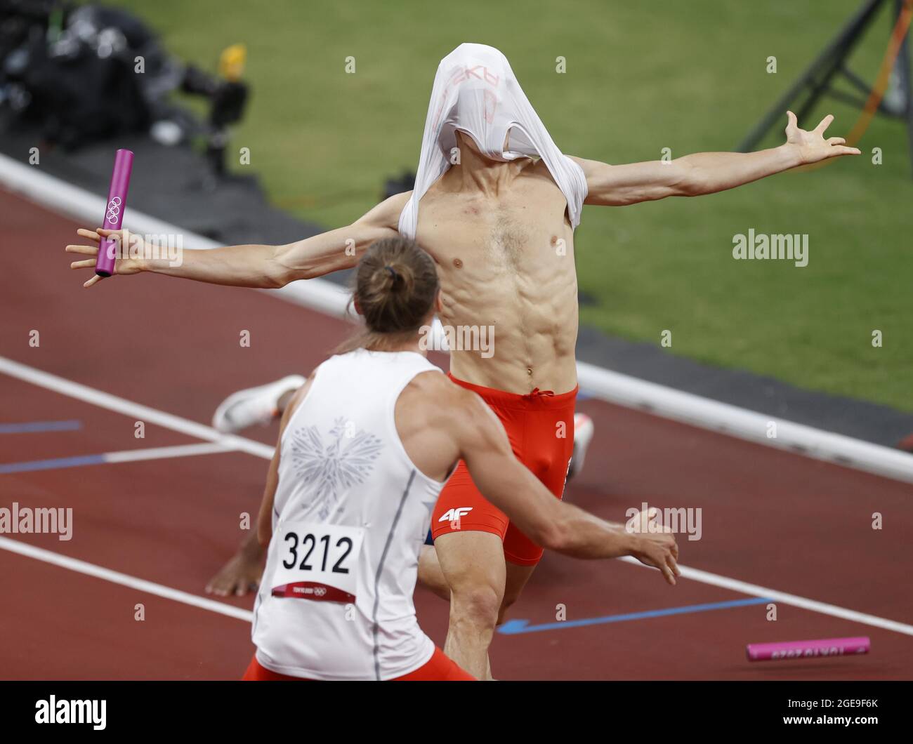 Kajetan Duszynski (R) celebrates after anchoring Poland to the gold ...