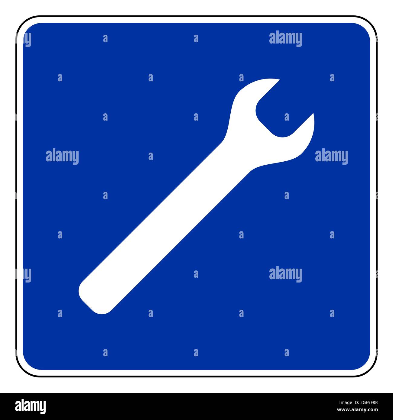 Wrench and road sign Stock Photo - Alamy