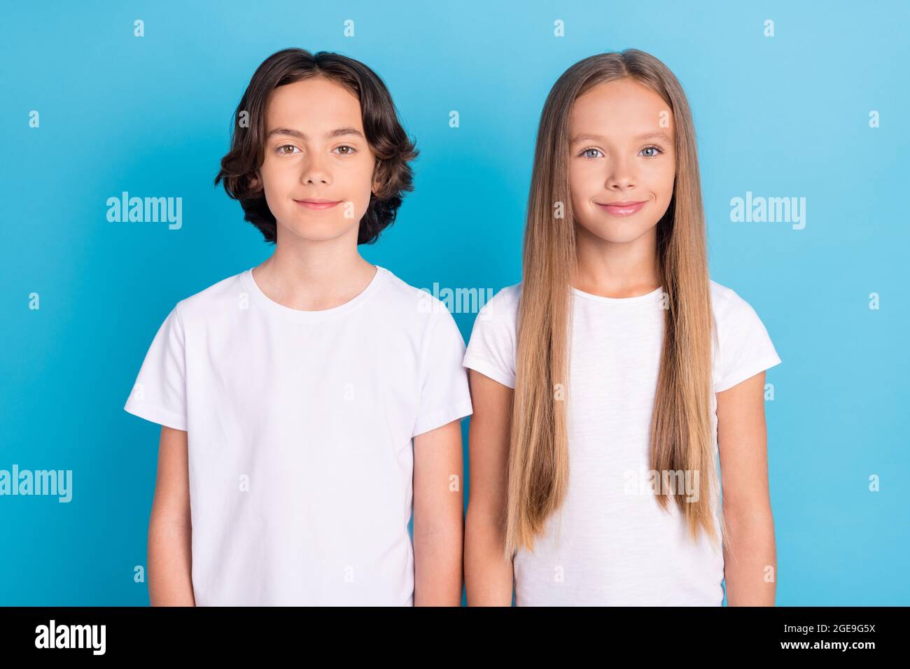 Photo of two best friends classmates smile look camera wear white t ...