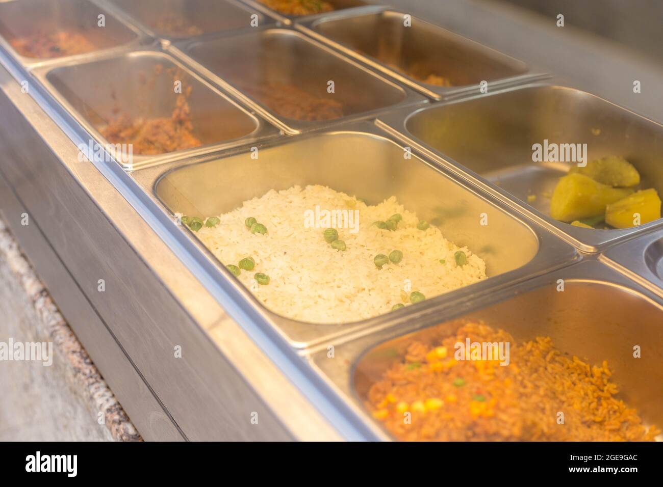 Display stand for buffet, Variety of African meals Stock Photo - Alamy