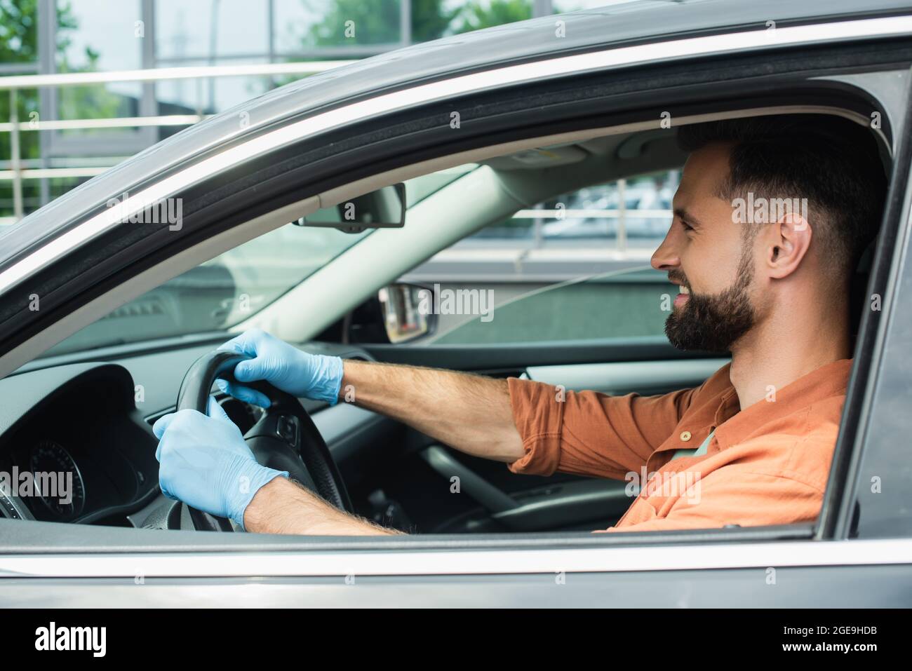 Profile young man driving car hi-res stock photography and images - Alamy