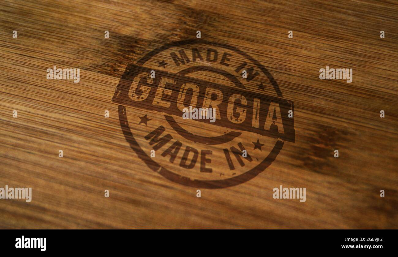 Made in Georgia stamp printed on wooden box. Factory, manufacturing and ...