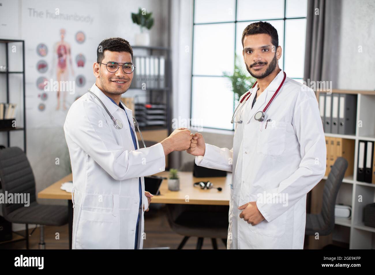 Fist bump hospital hi-res stock photography and images - Alamy