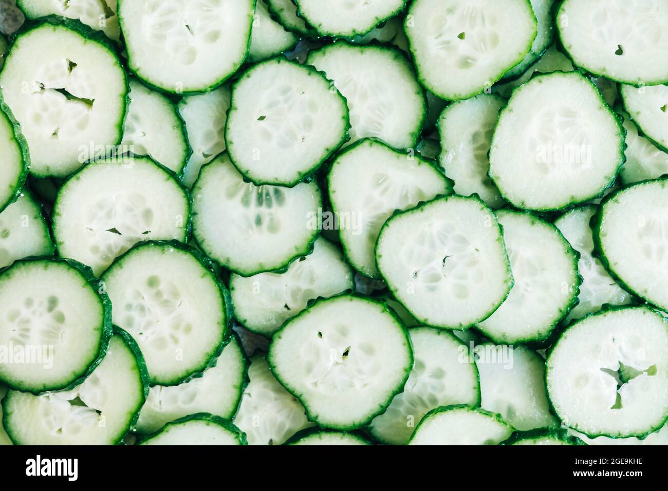 Fresh sliced cucumber, food background Stock Photo - Alamy